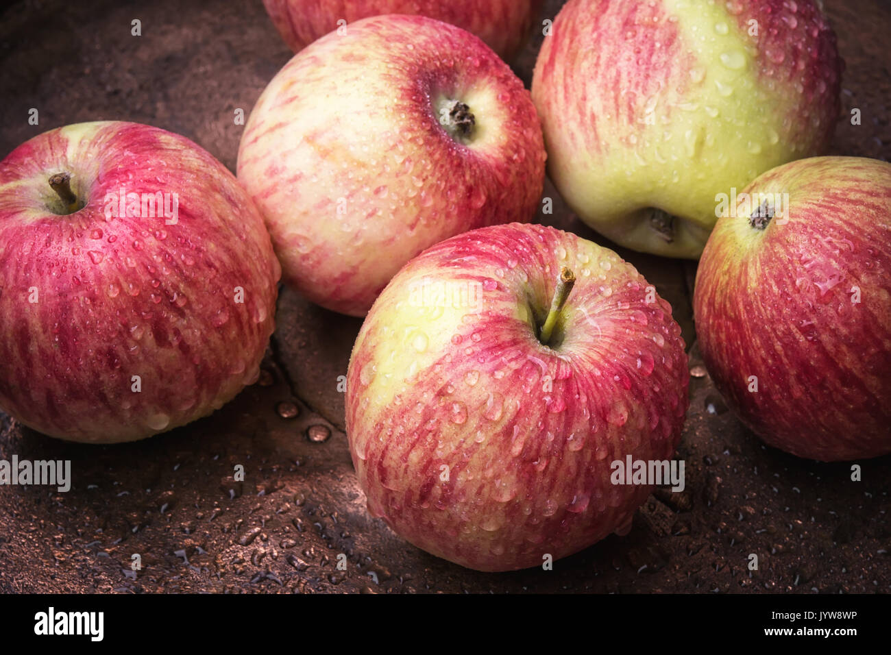 Autumn harvest of red apples on an old vintage background Stock Photo ...