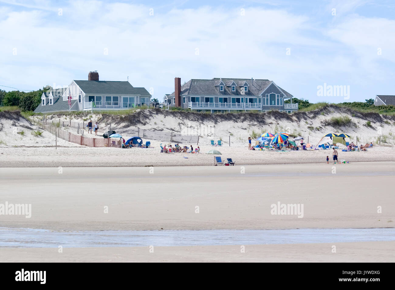 A day at the beach with upscale summer homes on Howes Beach - Dennis ...