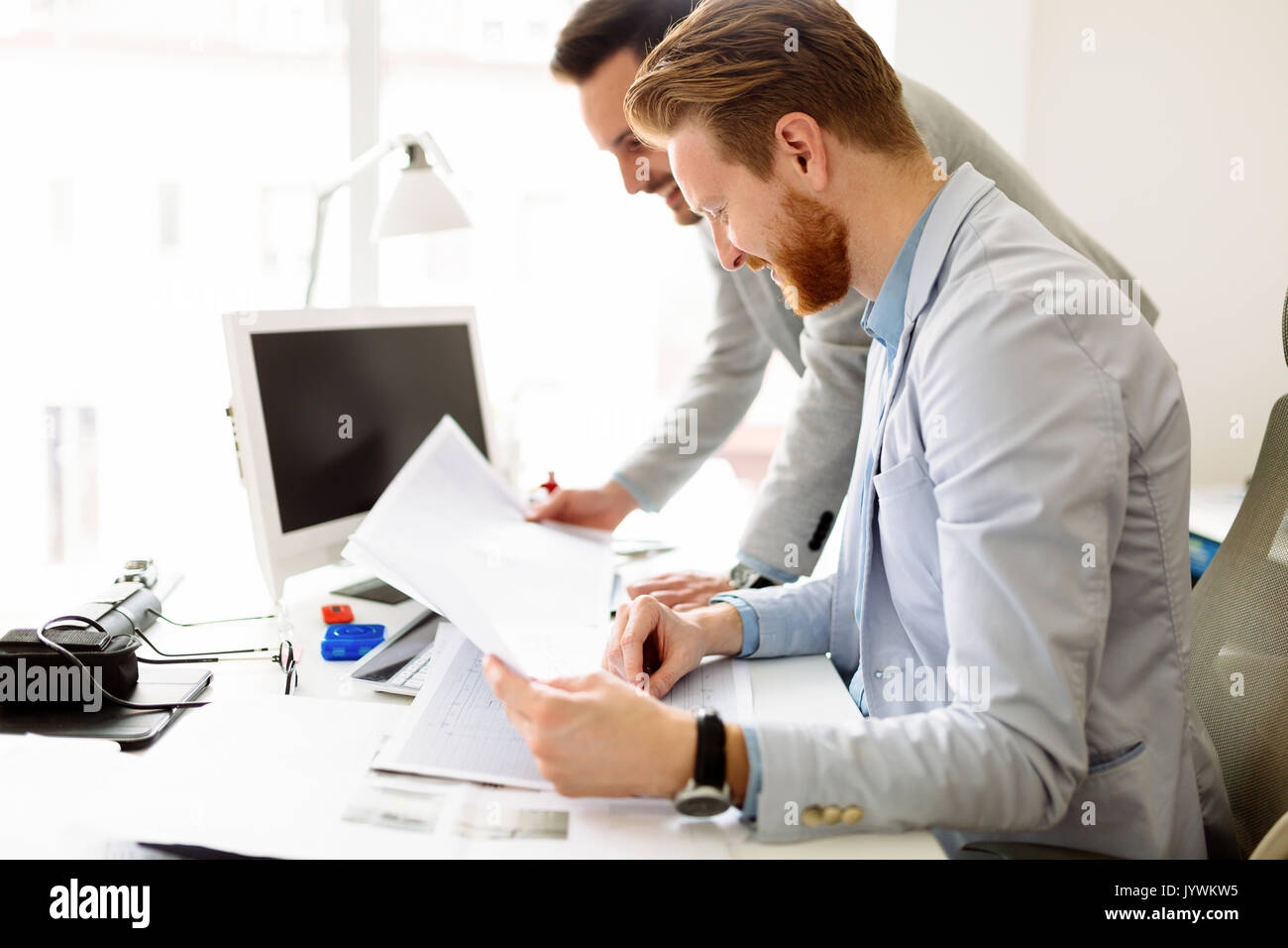 Business team working on project hi-res stock photography and images ...