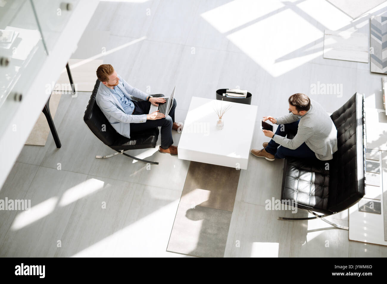 Business meeting in lobby Stock Photo - Alamy