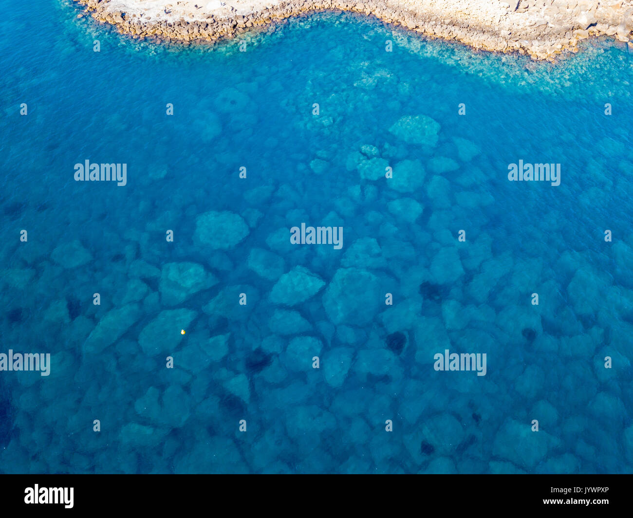 Aerial view of rocks on the sea. Overview of the seabed seen from above ...