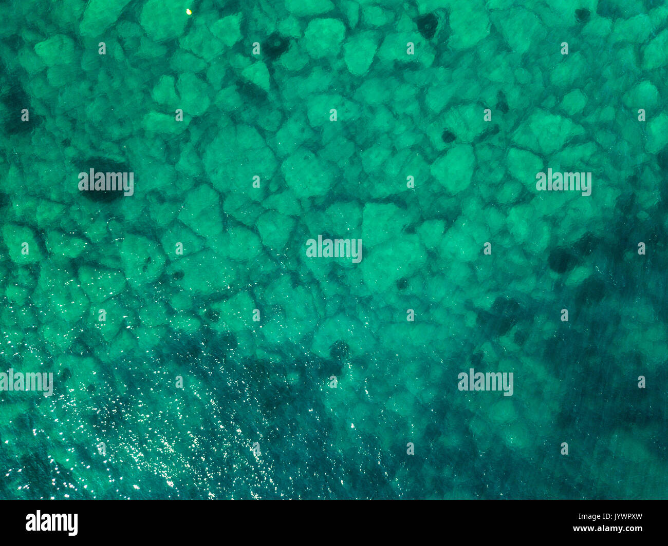 Aerial view of rocks on the sea. Overview of the seabed seen from above ...