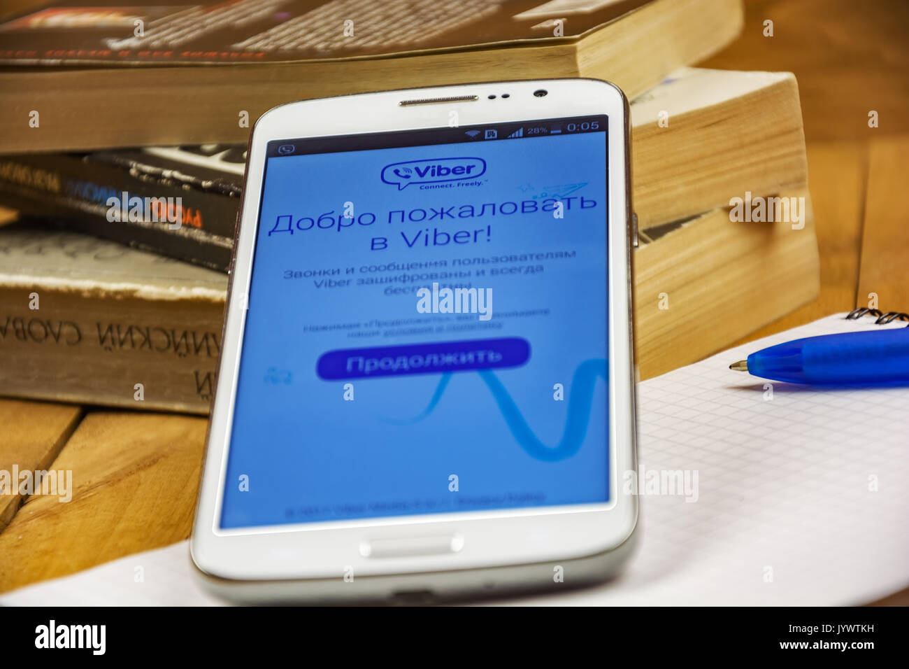 On the screen of the smartphone is opened the start page of the Viber ...