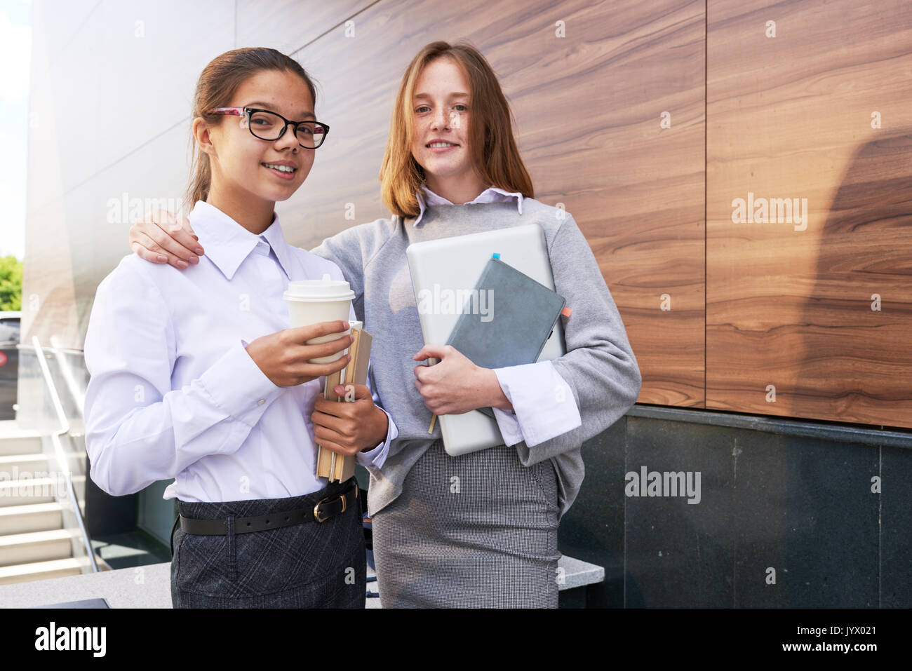 Pretty Students at School Lounge Stock Photo - Alamy