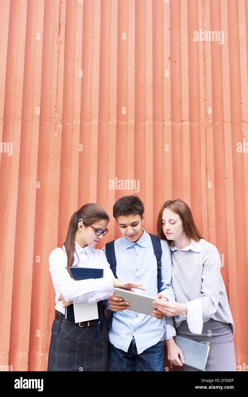 Teenage Students Collaborating on Project Stock Photo - Alamy