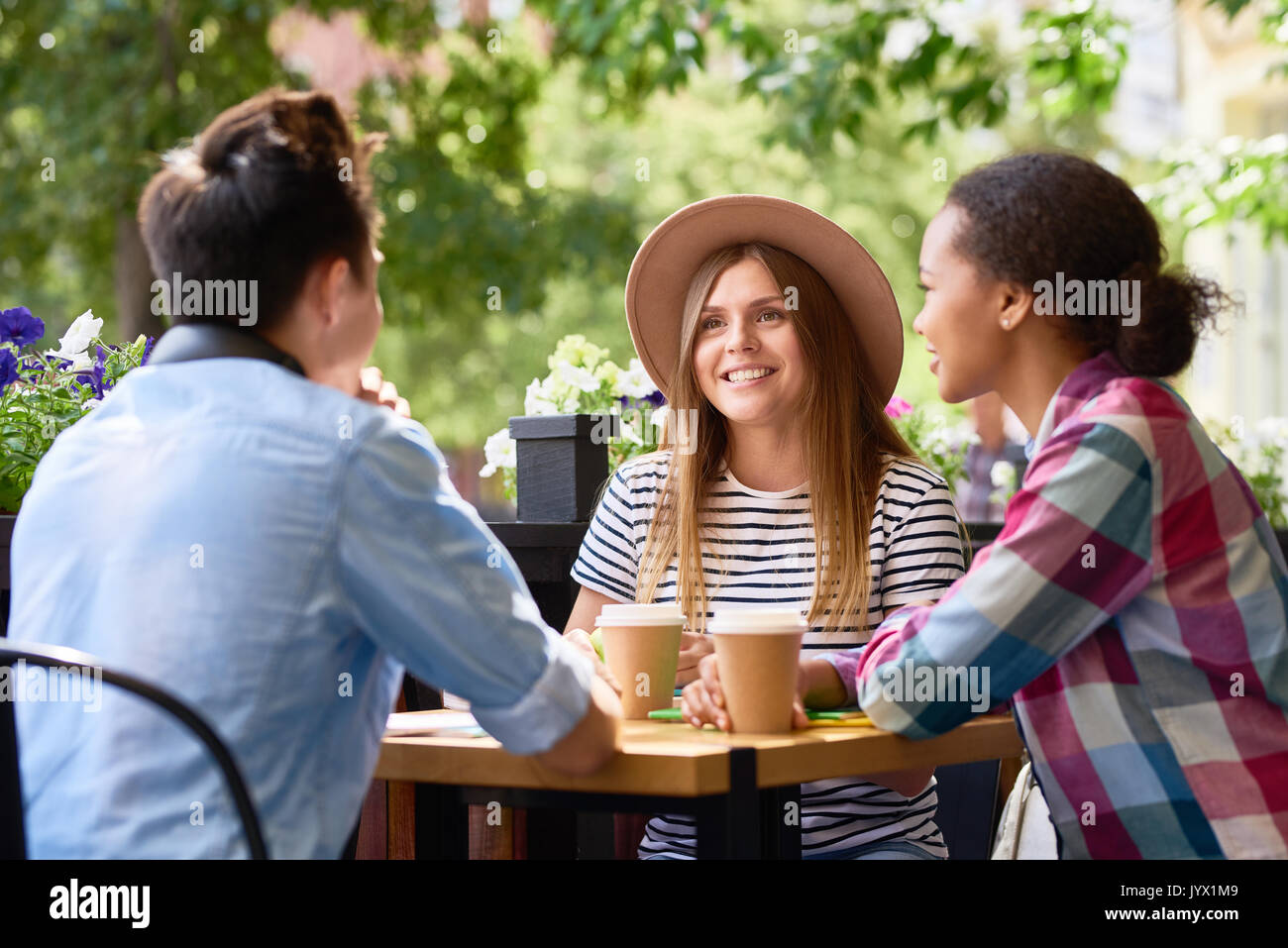 Students Chatting at Lunch in Cafe Outdoors Stock Photo - Alamy