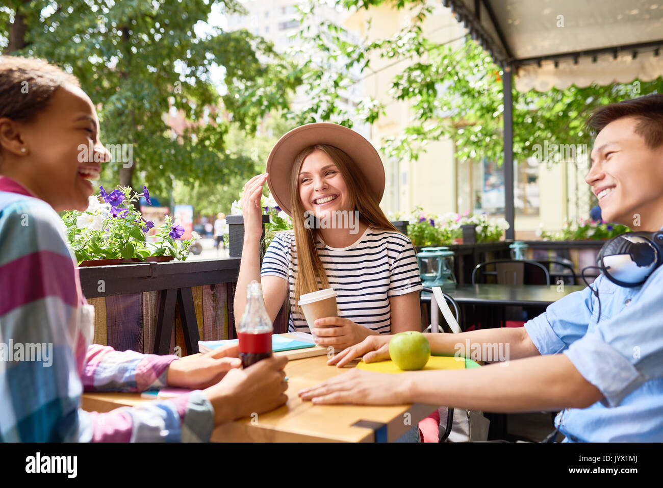 Young People at Lunch in Outdoor Cafe Stock Photo - Alamy