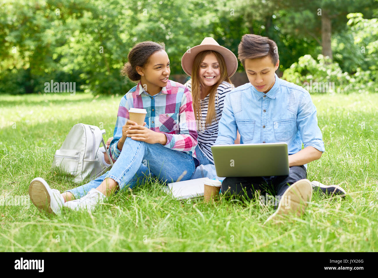 Group of Happy Students Enjoying Break on Lawn Stock Photo - Alamy