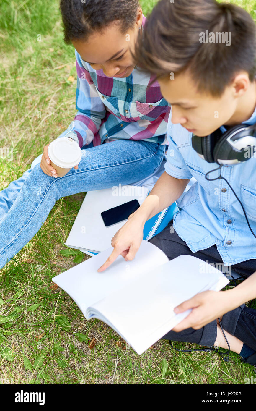 Boy doing homework outside hi-res stock photography and images - Alamy