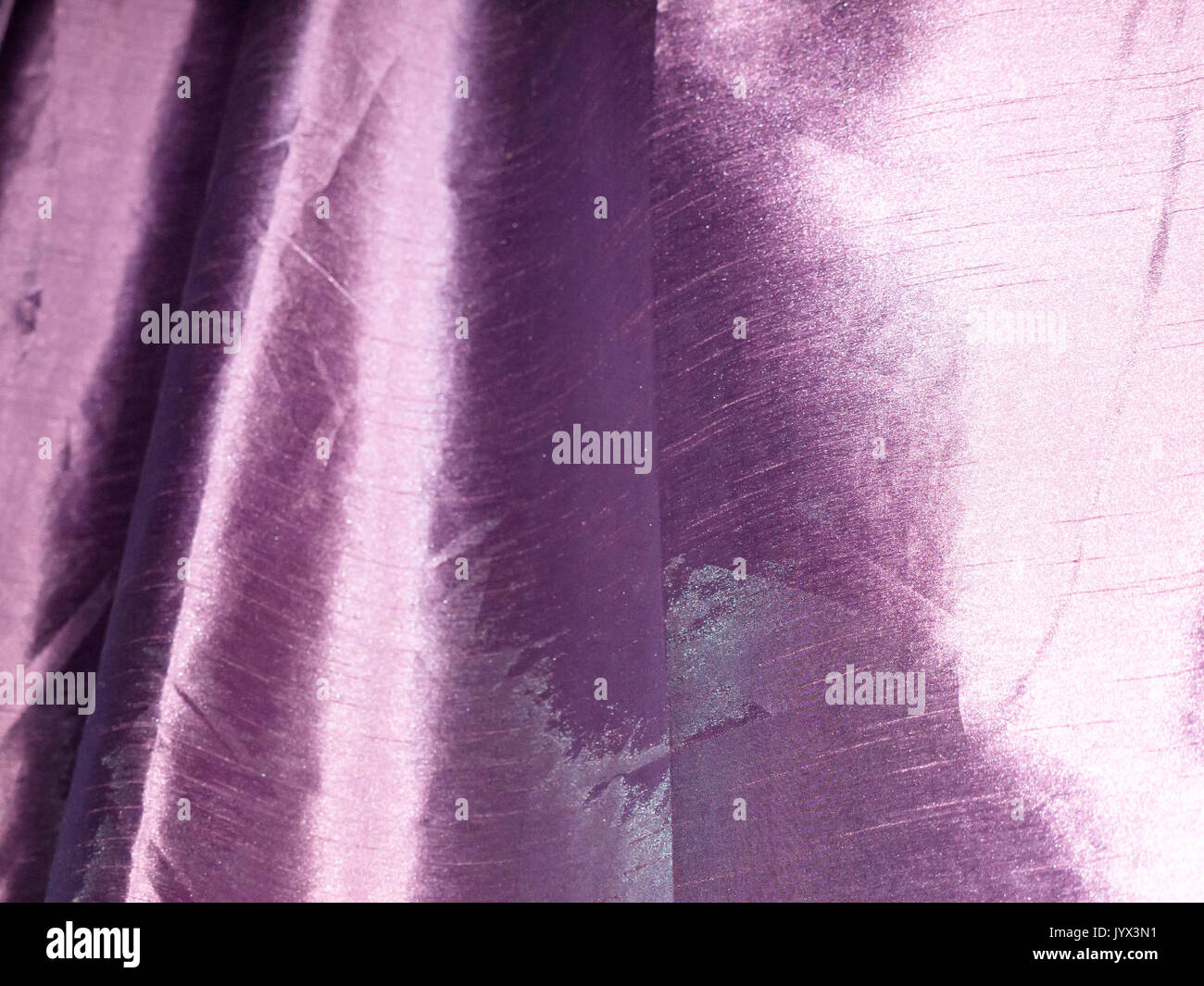 purple curtain detail texture fabric cloth shiny sheen; England; UK ...