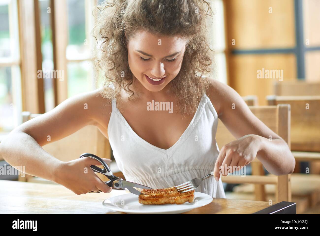 Beautiful woman having lunch at the restaurant Stock Photo - Alamy