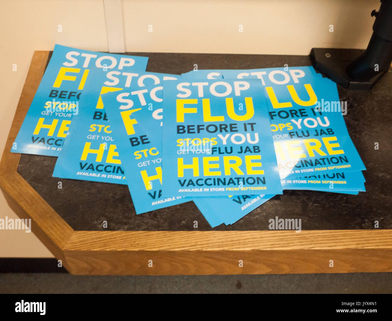 stop flu before it stops you hand outs on counter; England; UK Stock ...