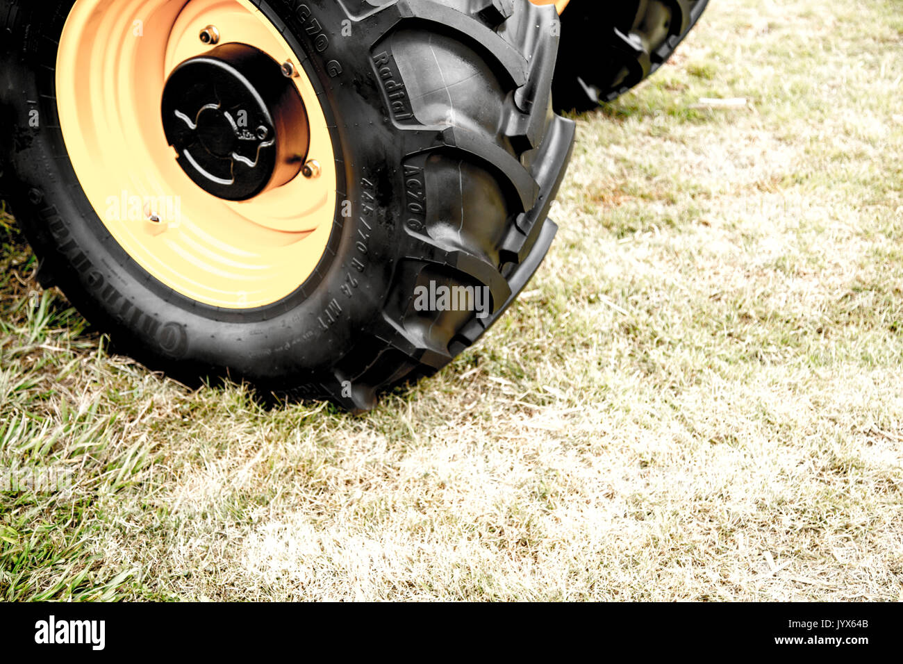 Hay tractor wheel Stock Photo - Alamy