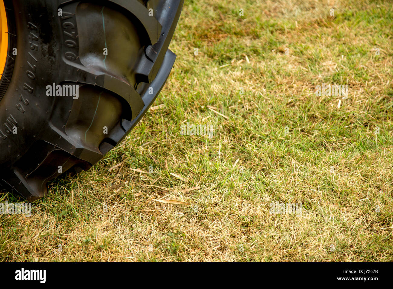 Hay tractor wheel Stock Photo - Alamy