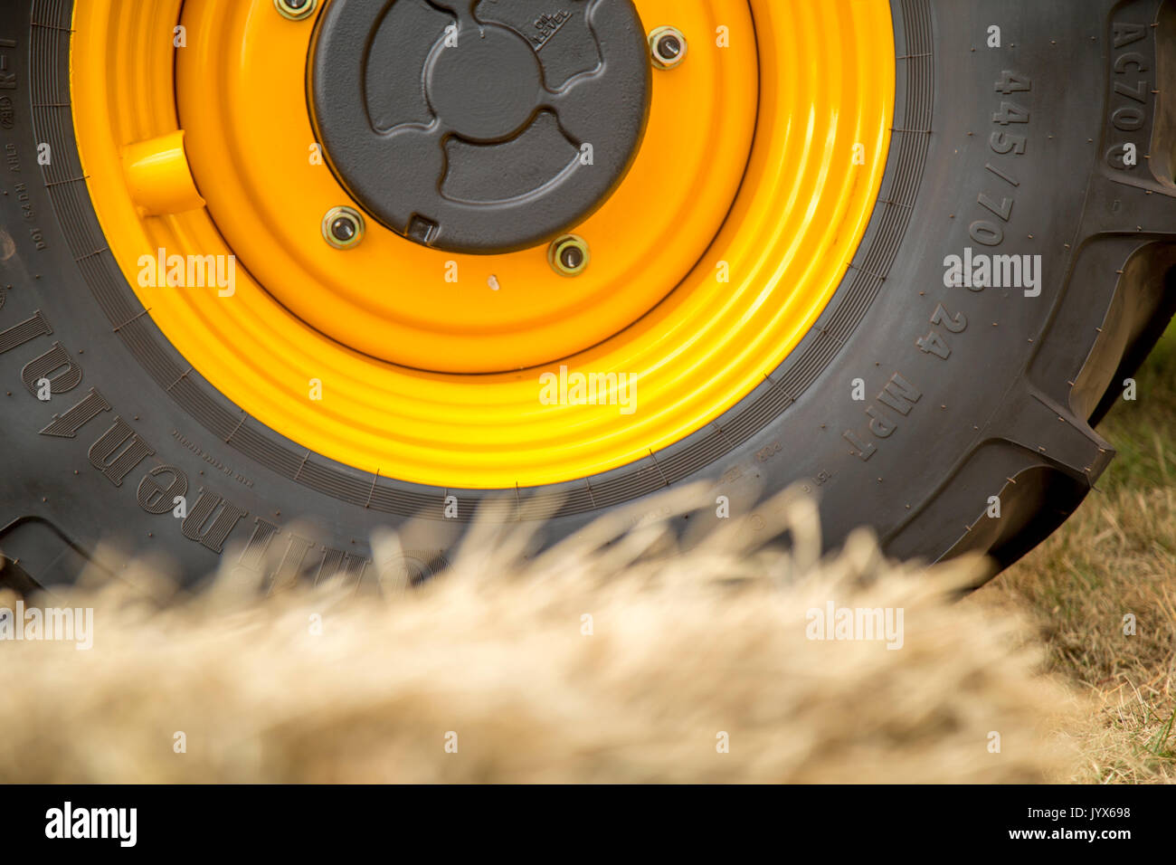 Hay tractor wheel Stock Photo - Alamy
