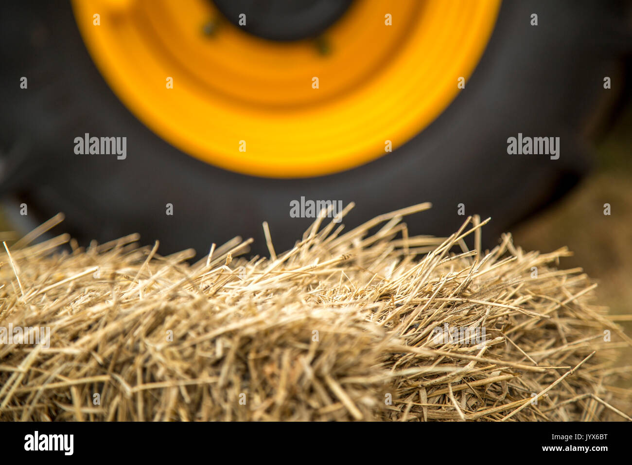 Hay tractor wheel Stock Photo - Alamy