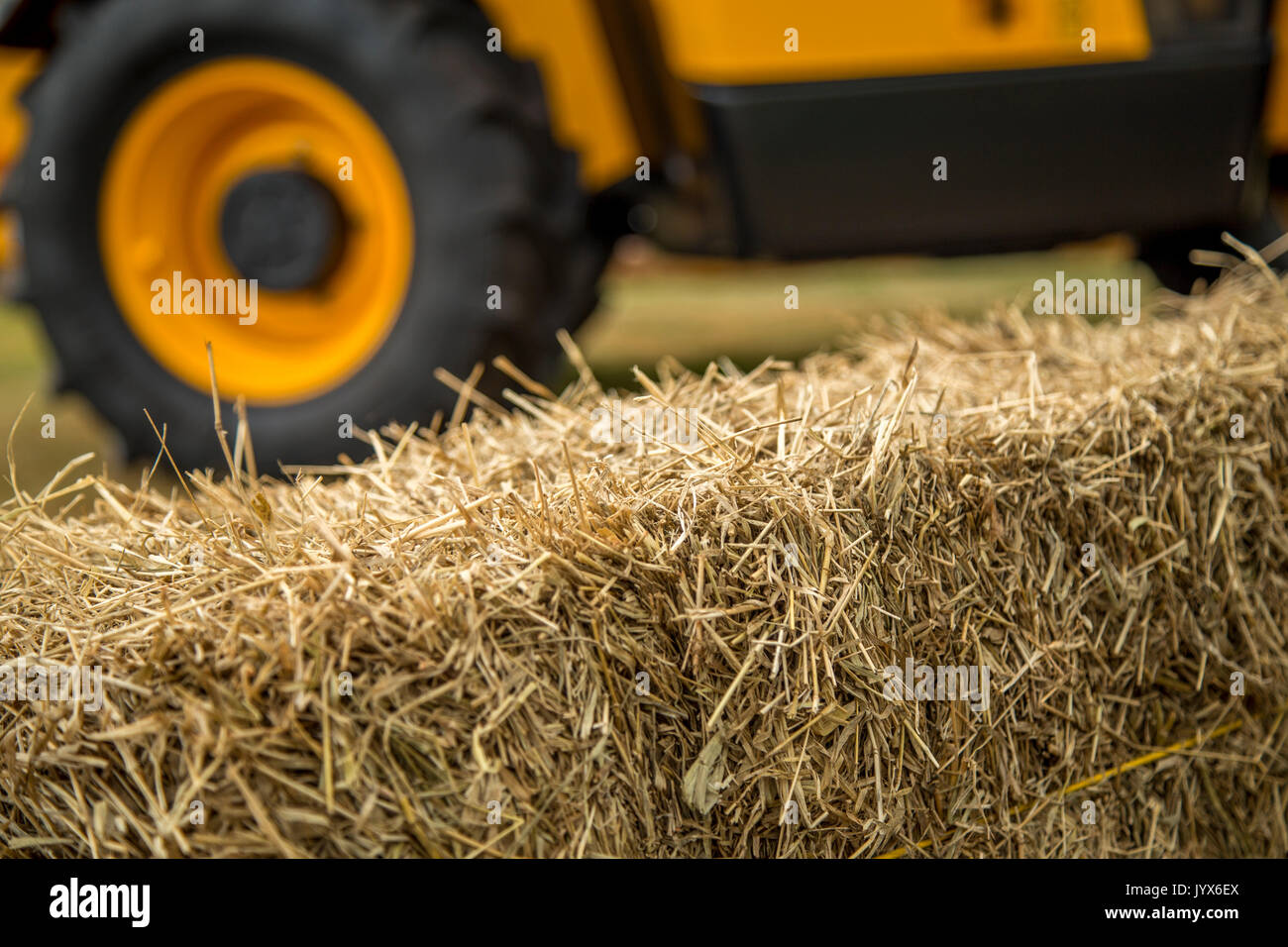 Hay tractor wheel Stock Photo - Alamy