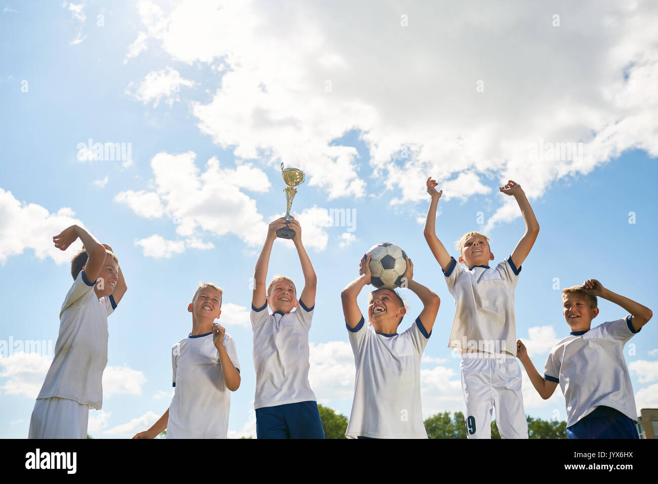 Junior Football Team Celebrating Victory Stock Photo - Alamy