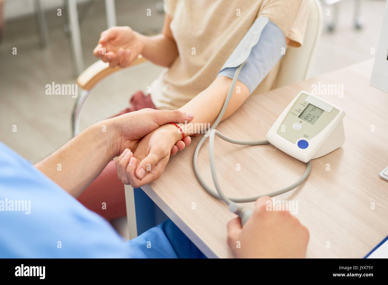 Doctor Measuring Blood Pressure Closeup Stock Photo - Alamy