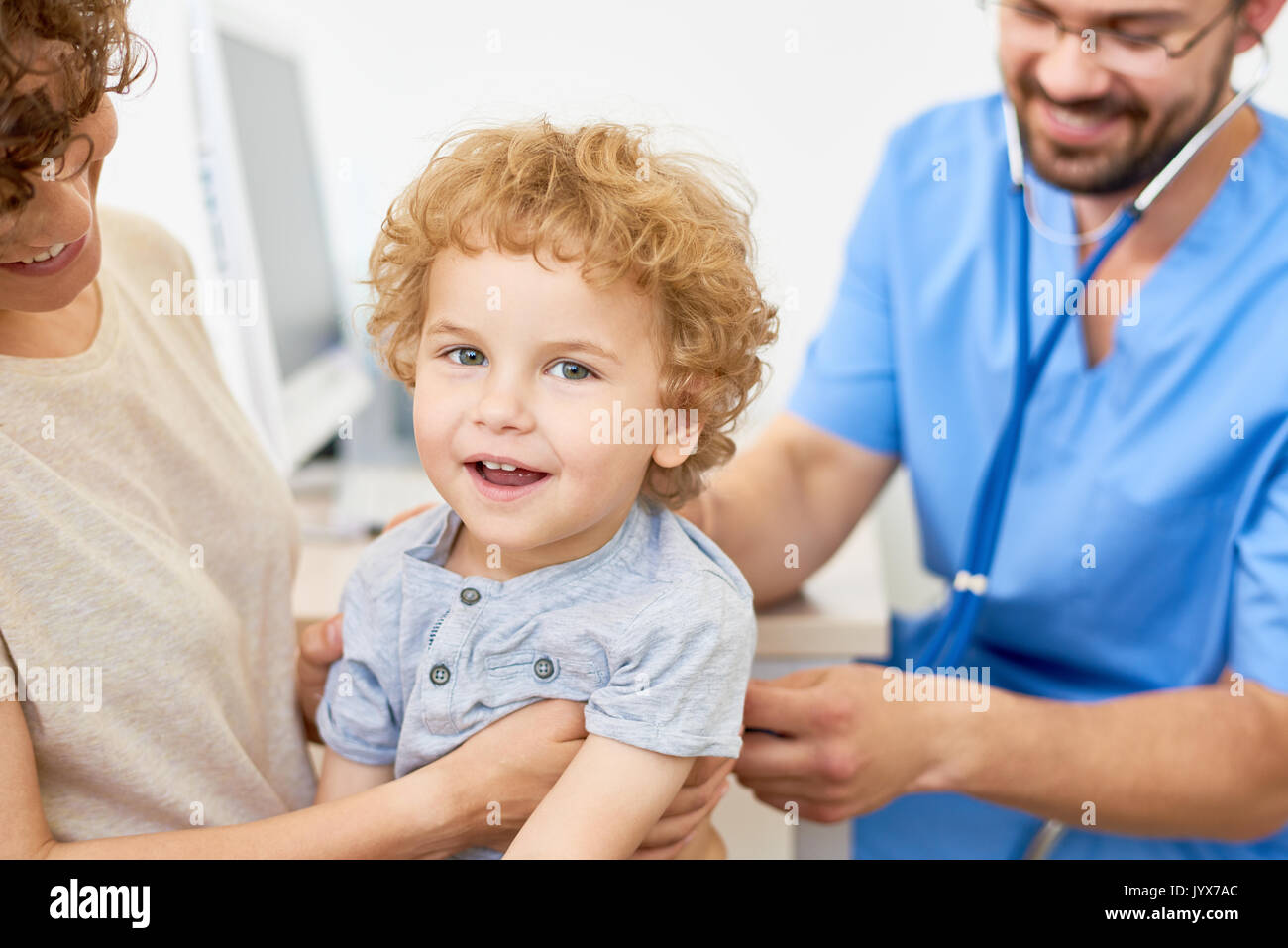 Happy Child Visiting Doctor Stock Photo - Alamy