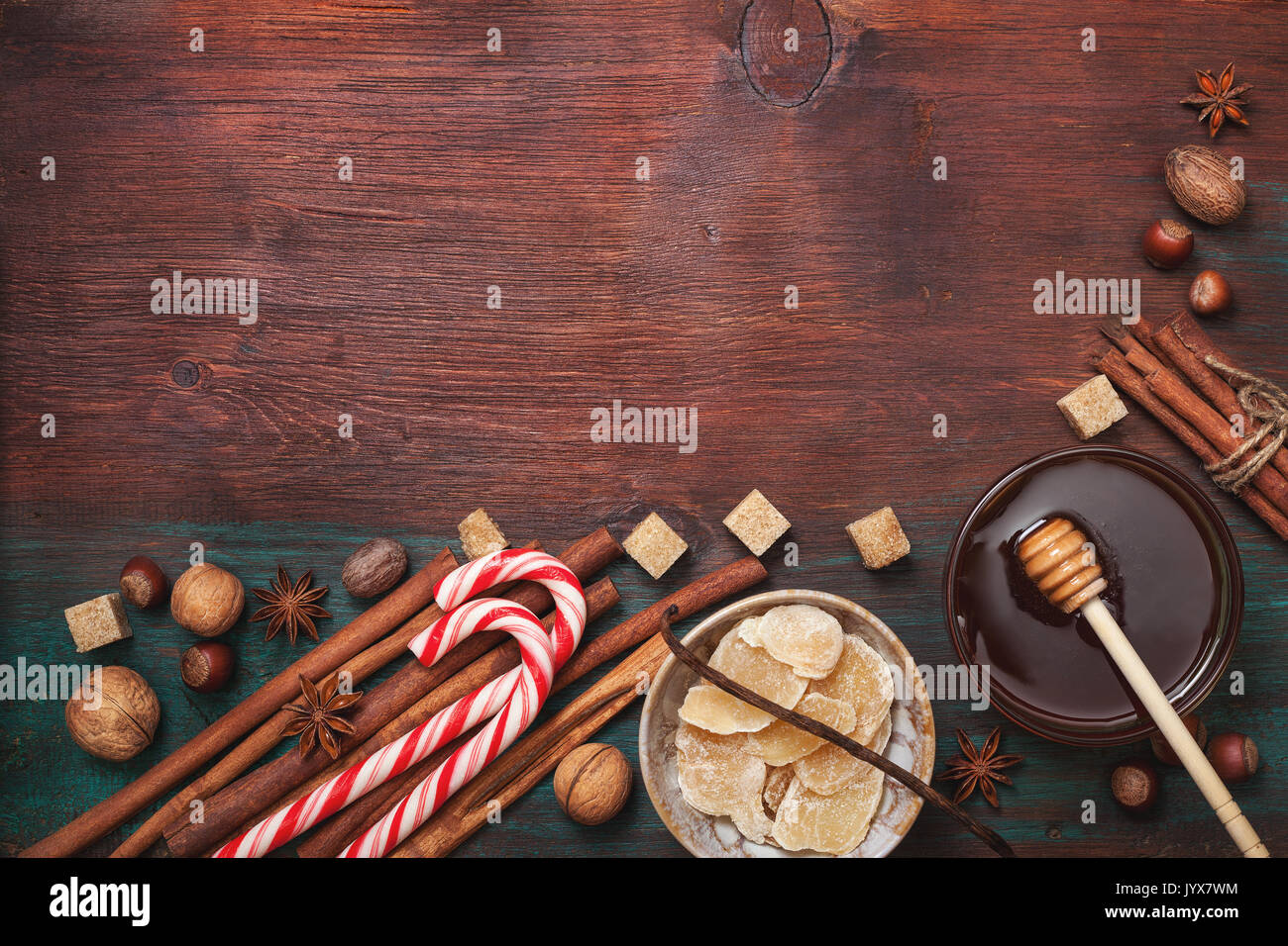 Winter spices and ingredients for cooking. Cinnamon sticks, hazelnuts ...