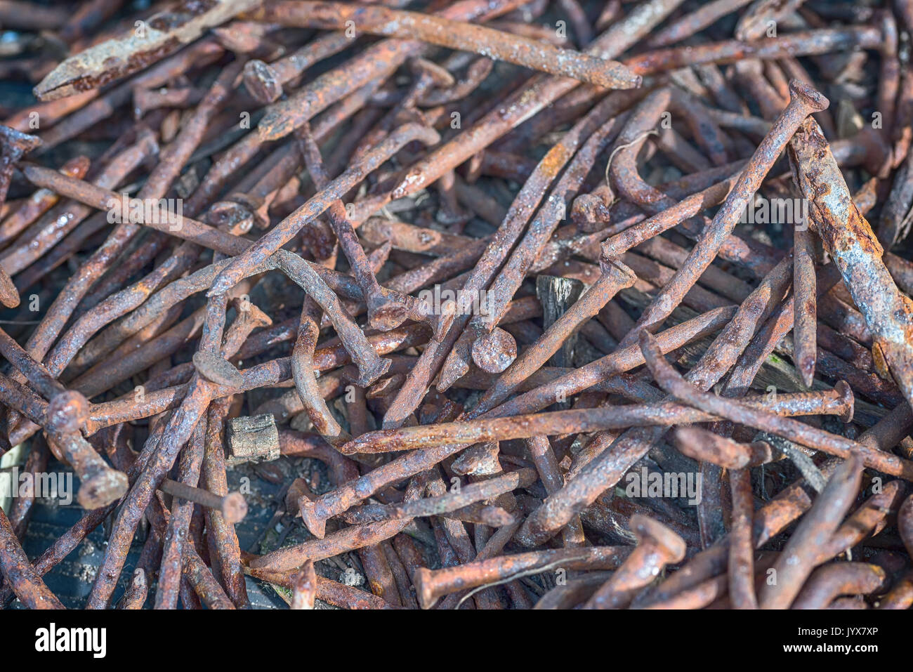Close up bent rusty nail hi-res stock photography and images - Alamy