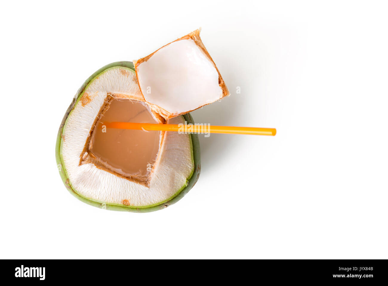 open fresh coconut with straw isolated on white Stock Photo - Alamy