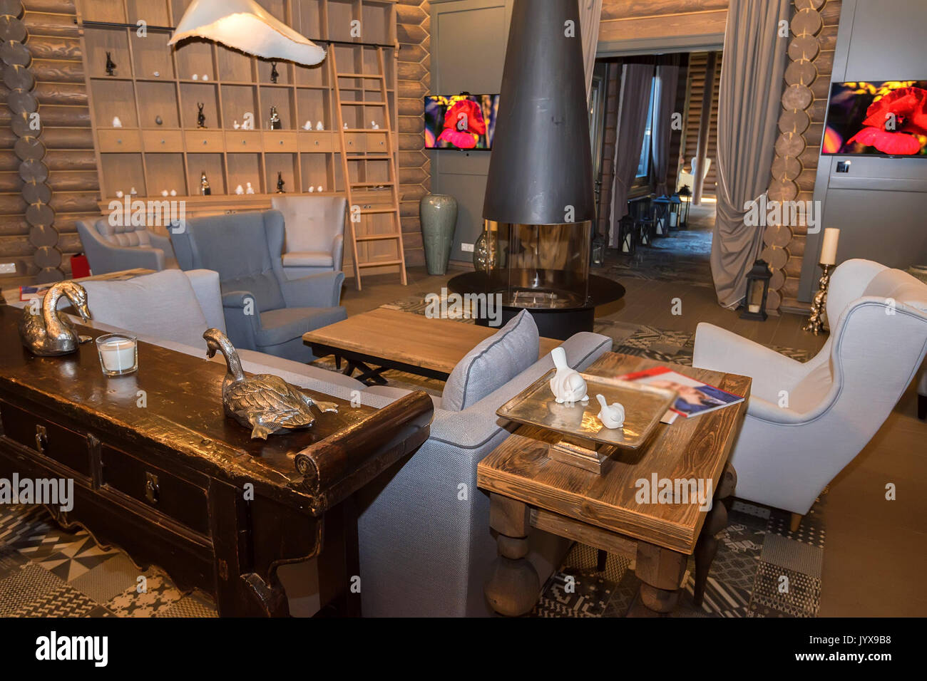 Small cozy hall with fireplace Stock Photo - Alamy