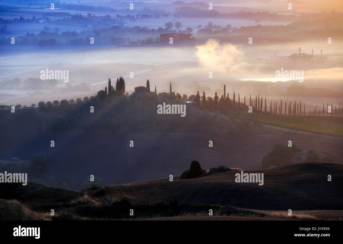 Tuscan landscape with cypress trees and farmstead at sunrise, dawn, San ...