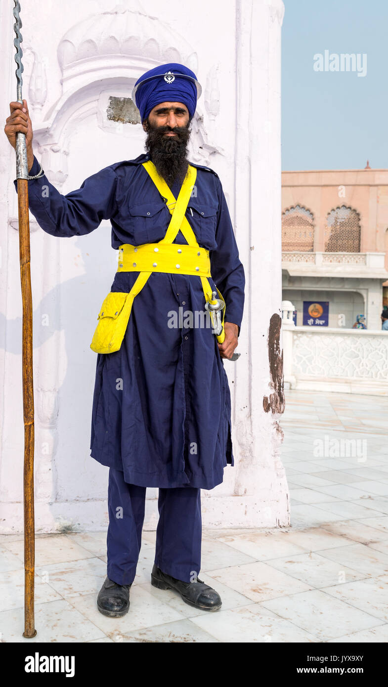 Sikh guard at The Golden Temple Complex in the Sikh city of Amritsar ...