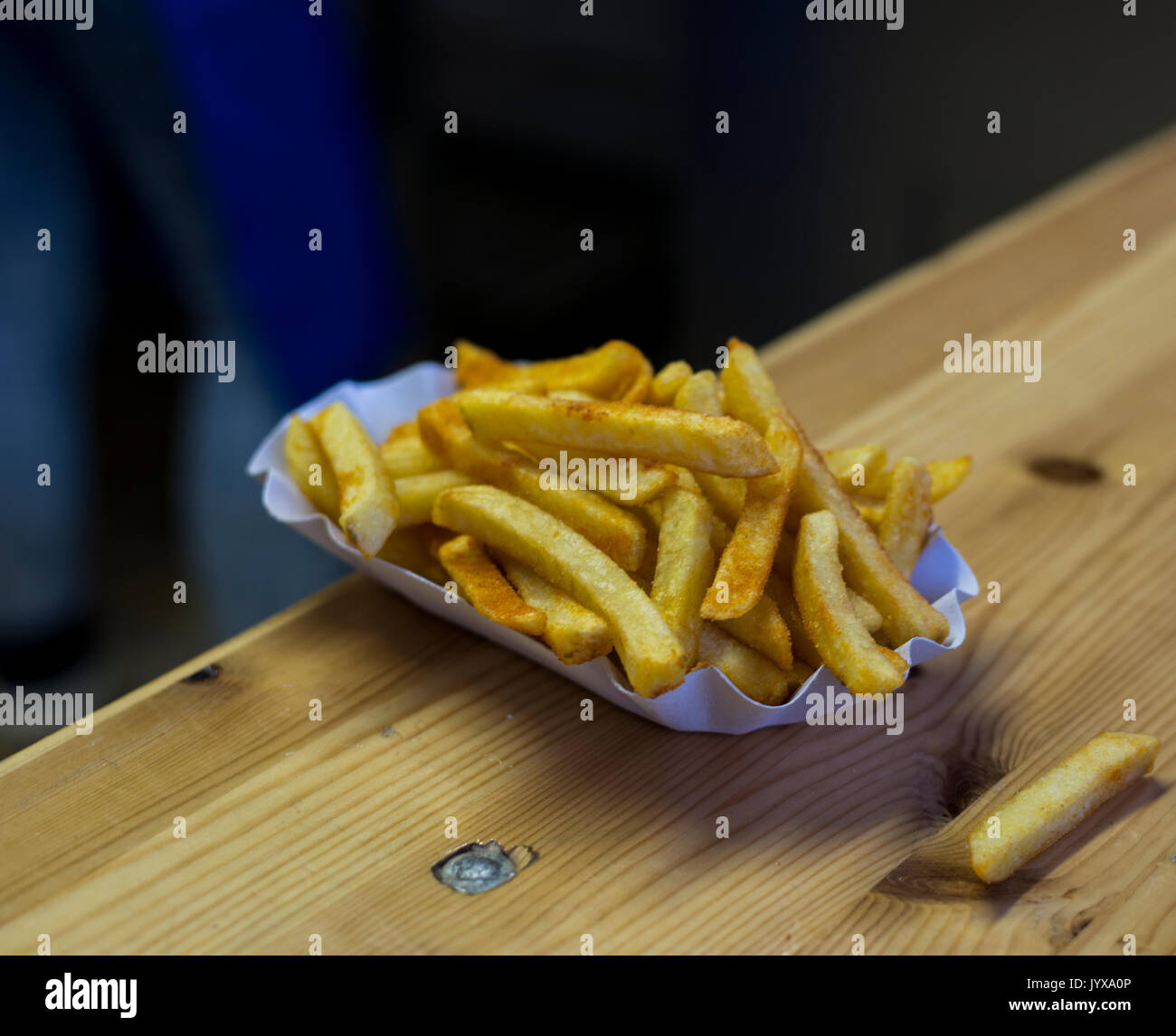 French fries in cardboard box on counter Stock Photo - Alamy