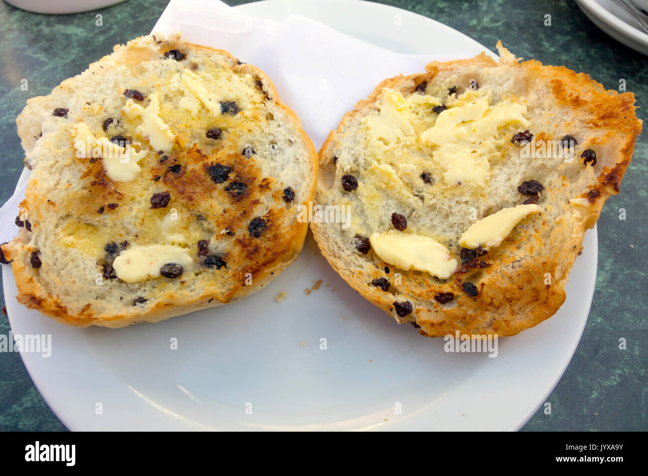 Buttered toasted teacakes a breakfast or afternoon tea snack in England ...