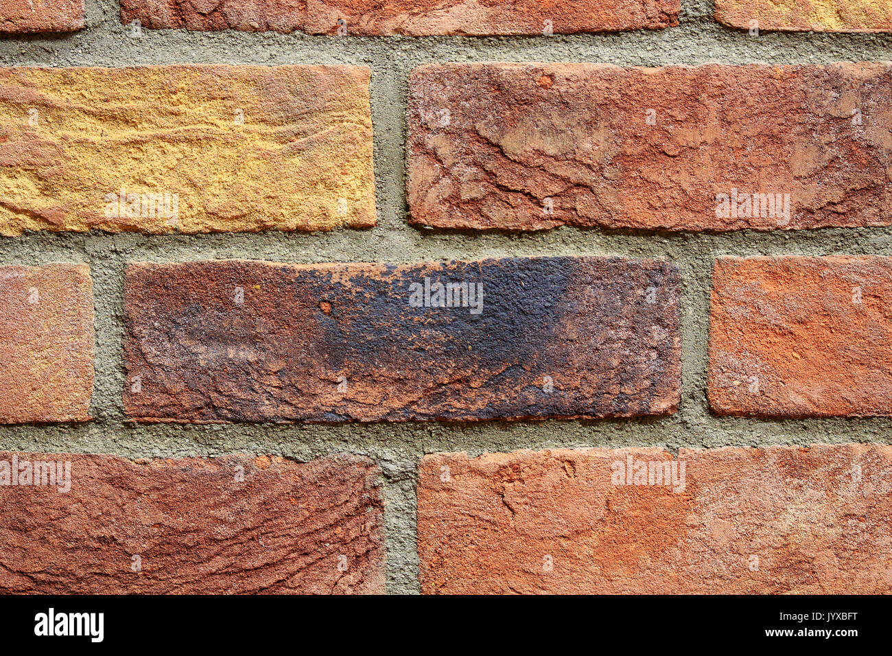 Colourful old brick wall texture background pattern Stock Photo - Alamy