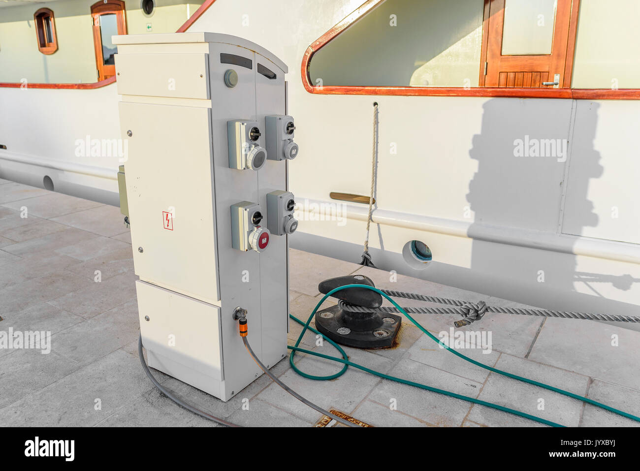 Station for recharging the battery of ships on the pier Stock Photo - Alamy
