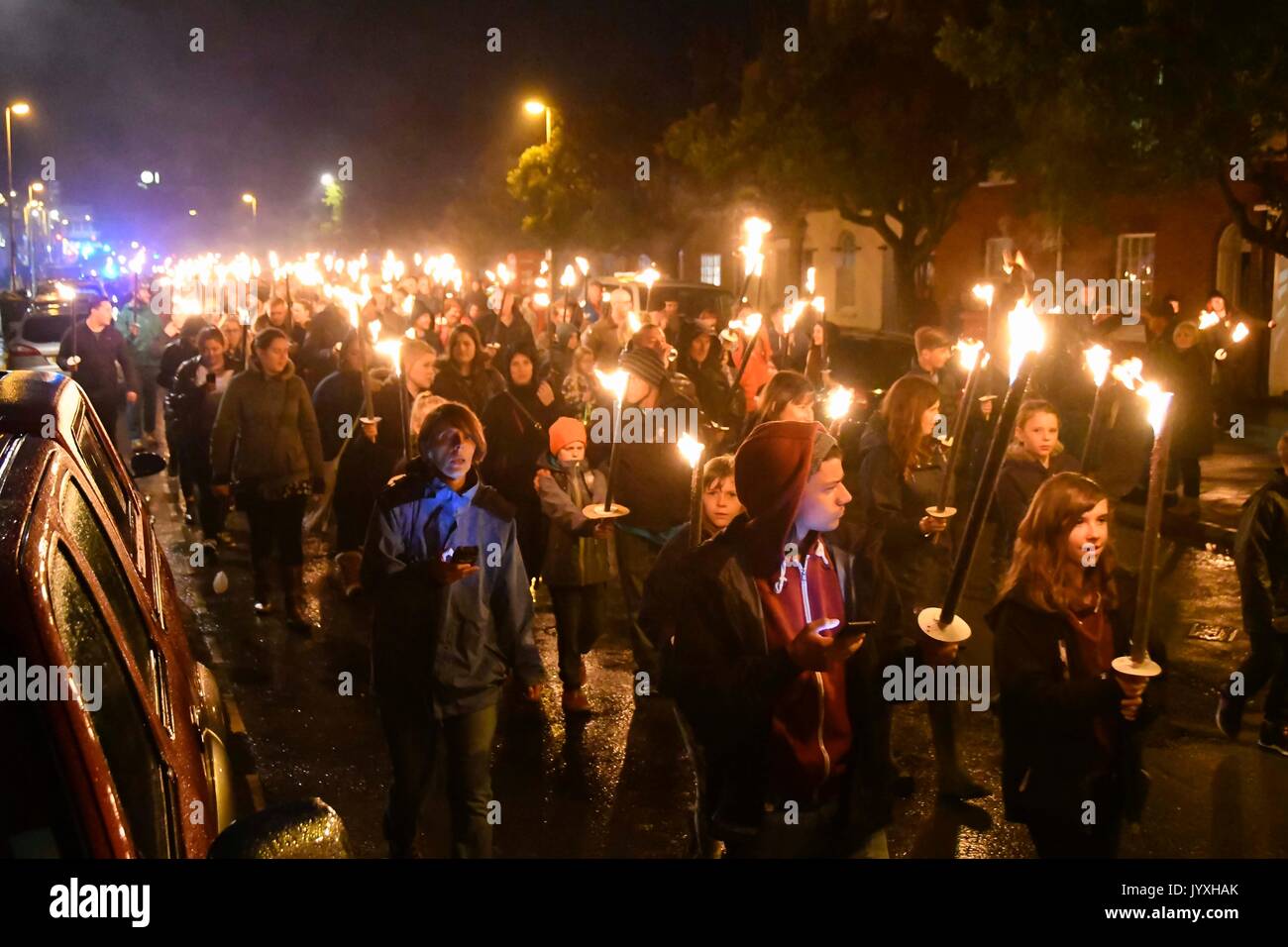 Bridport, Dorset, UK. 20th August 2017. Hundreds of people led by the ...