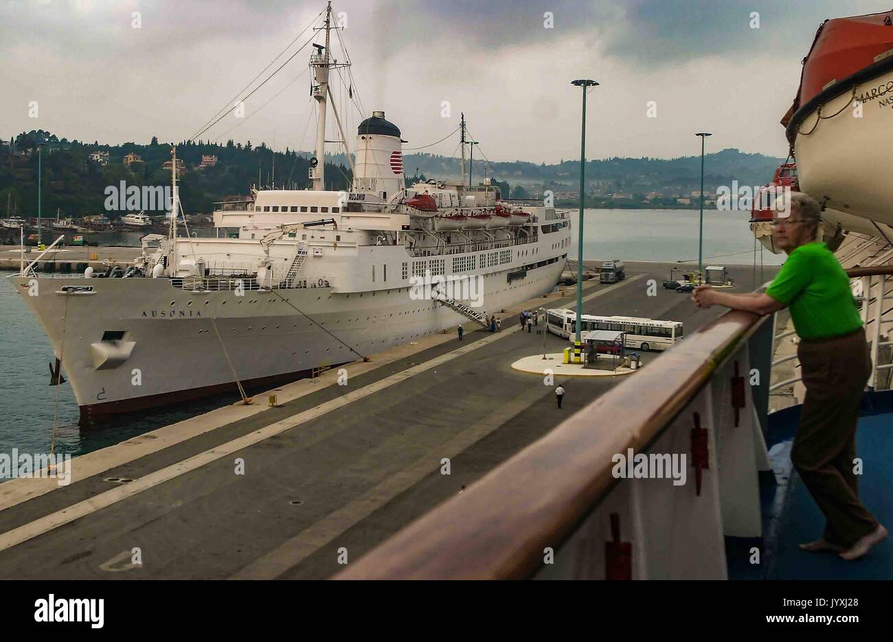 Corfu, Greece. 10th Oct, 2004. A cruise ship passenger watches as the ...