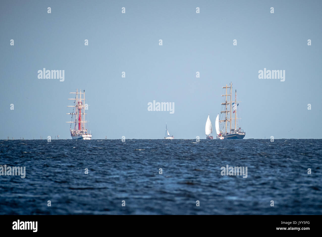 Big sailing ships sails to the full sea after final of Tall Ships Races ...