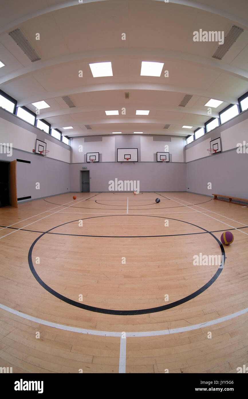 Ultra wide angle views of a ball in a modern sports hall or gymnasium ...