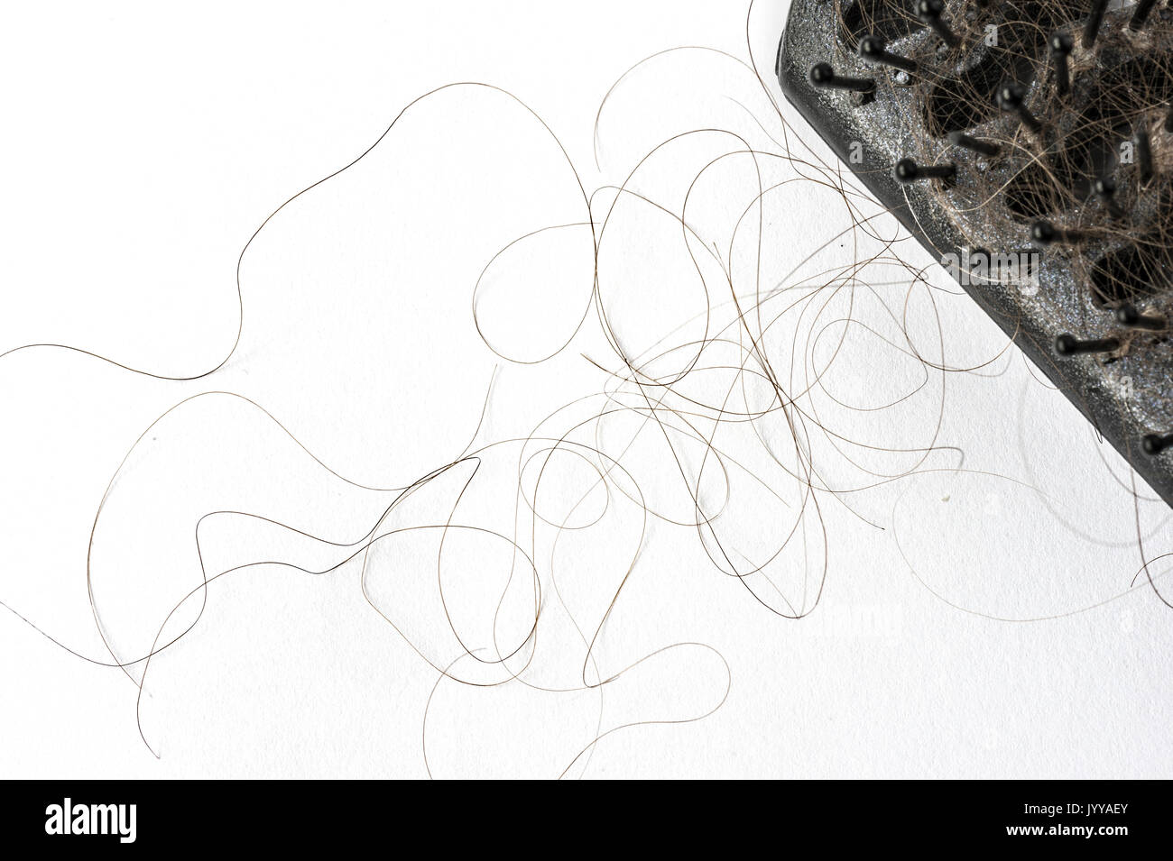 Hairs falling hi-res stock photography and images - Alamy