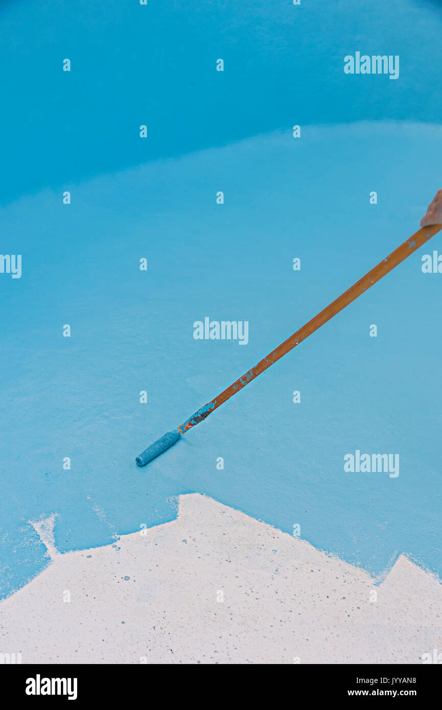 Fresh Coat Of Blue Paint In Swimming Pool Stock Photo - Alamy