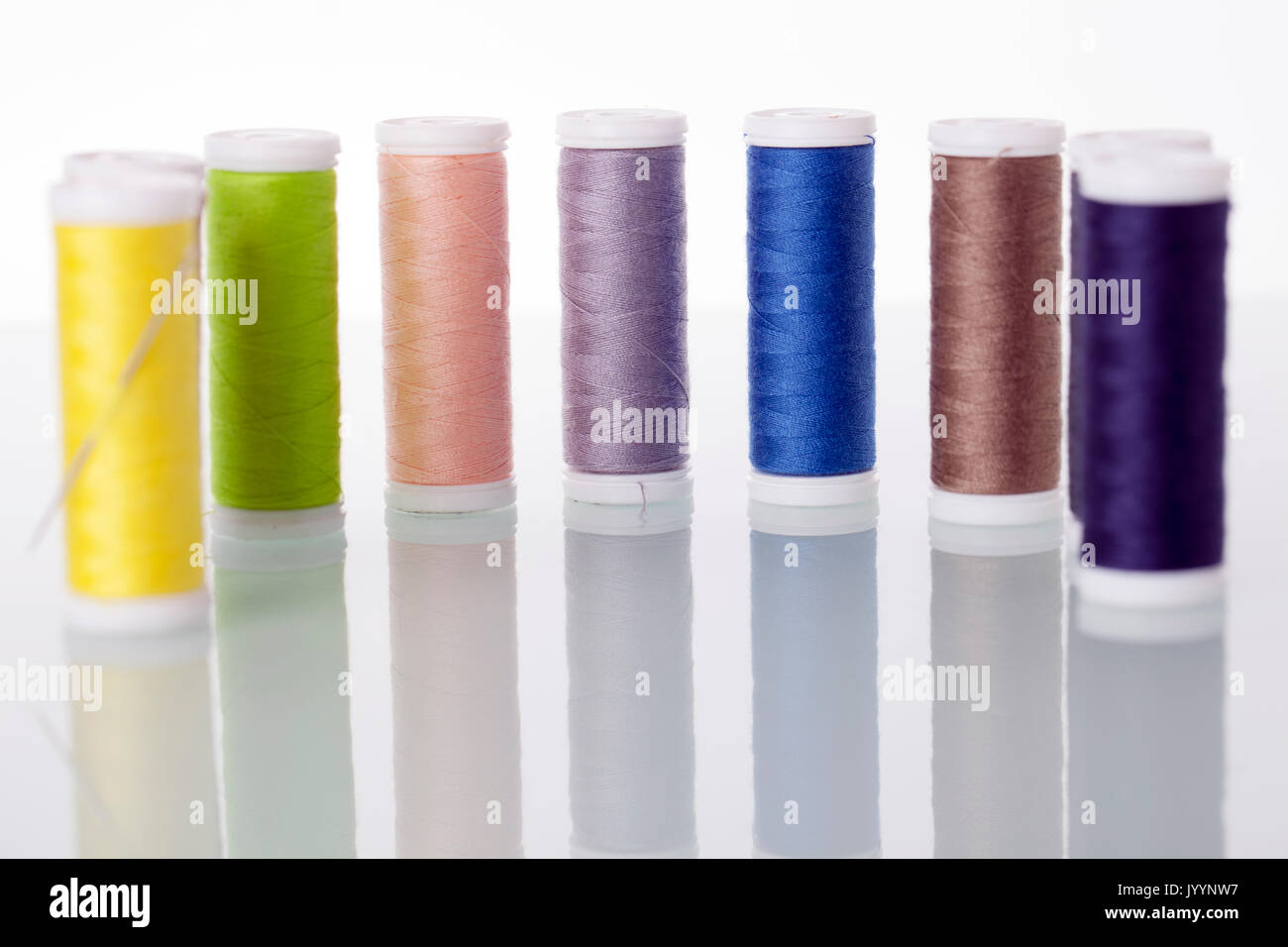 Sewing threads isolated on white background. Studio Shot Stock Photo ...