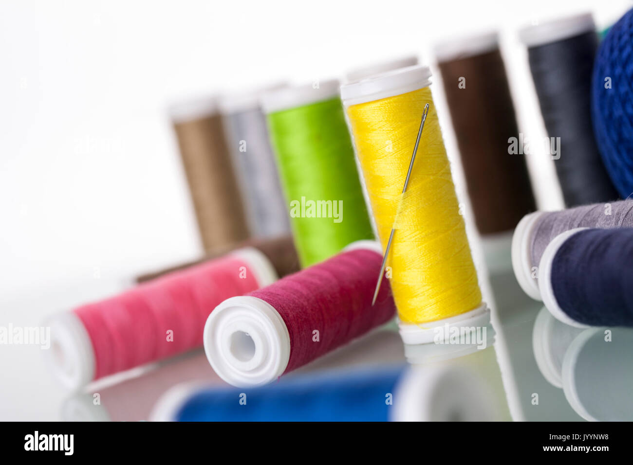 Sewing threads isolated on white background. Studio Shot Stock Photo ...