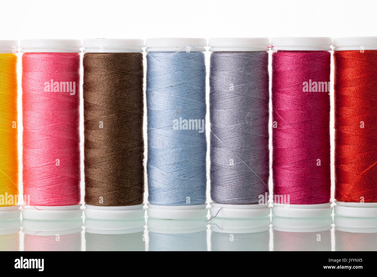 Sewing threads isolated on white background. Studio Shot Stock Photo ...