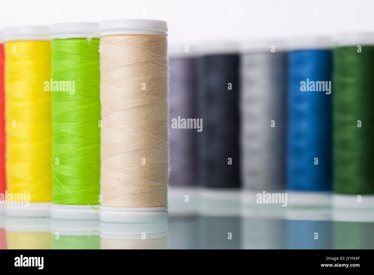 Sewing threads isolated on white background. Studio Shot Stock Photo ...