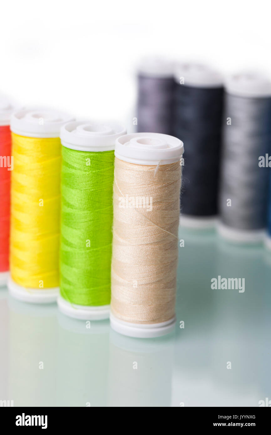 Sewing threads isolated on white background. Studio Shot Stock Photo ...