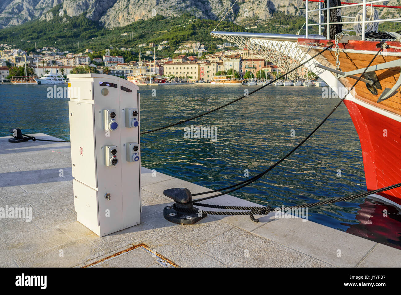 Station for recharging the battery of ships on the pier Stock Photo - Alamy