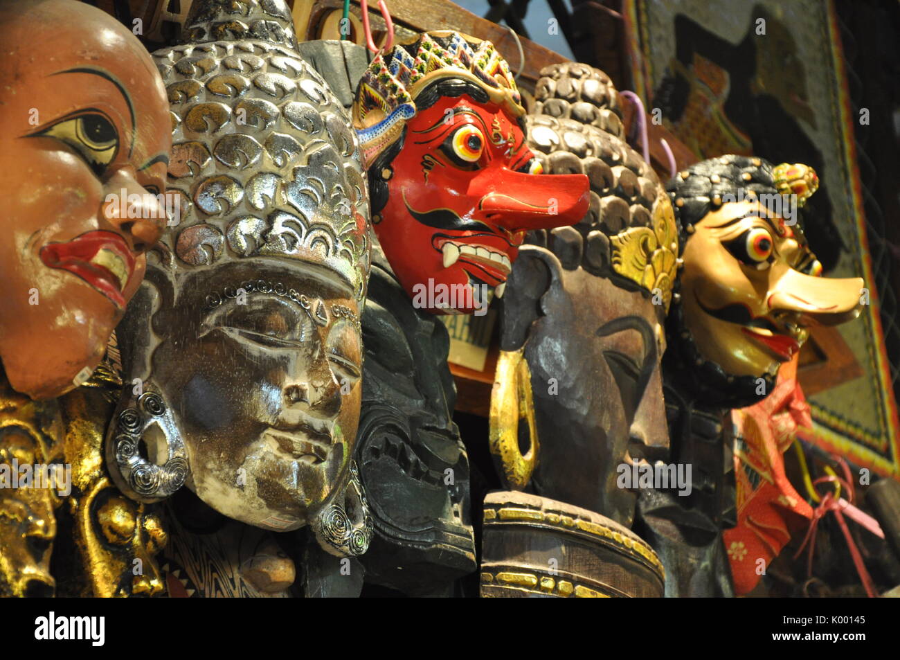 A collection of masks at a market Stock Photo - Alamy