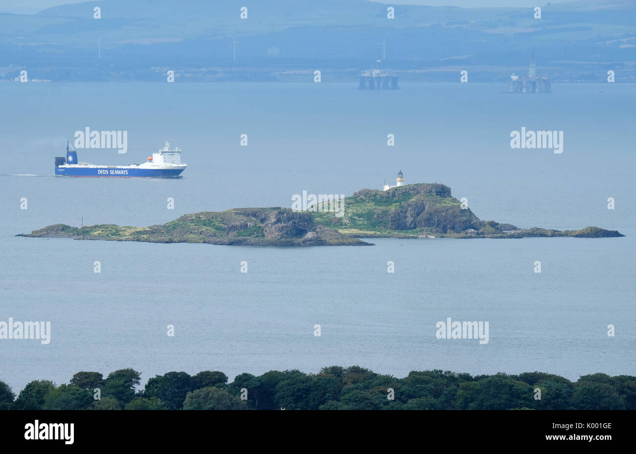 A DFDS cargo ship passes the uninhabited Fidra Island in the Firth of ...