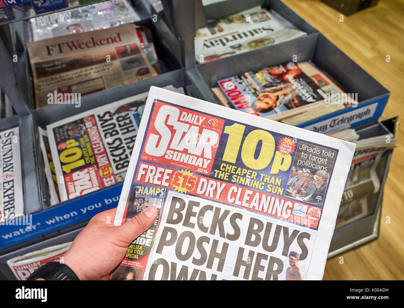 LONDON, ENGLAND - MAY 14, 2017 : A hand holding Daily Star Sunday ...
