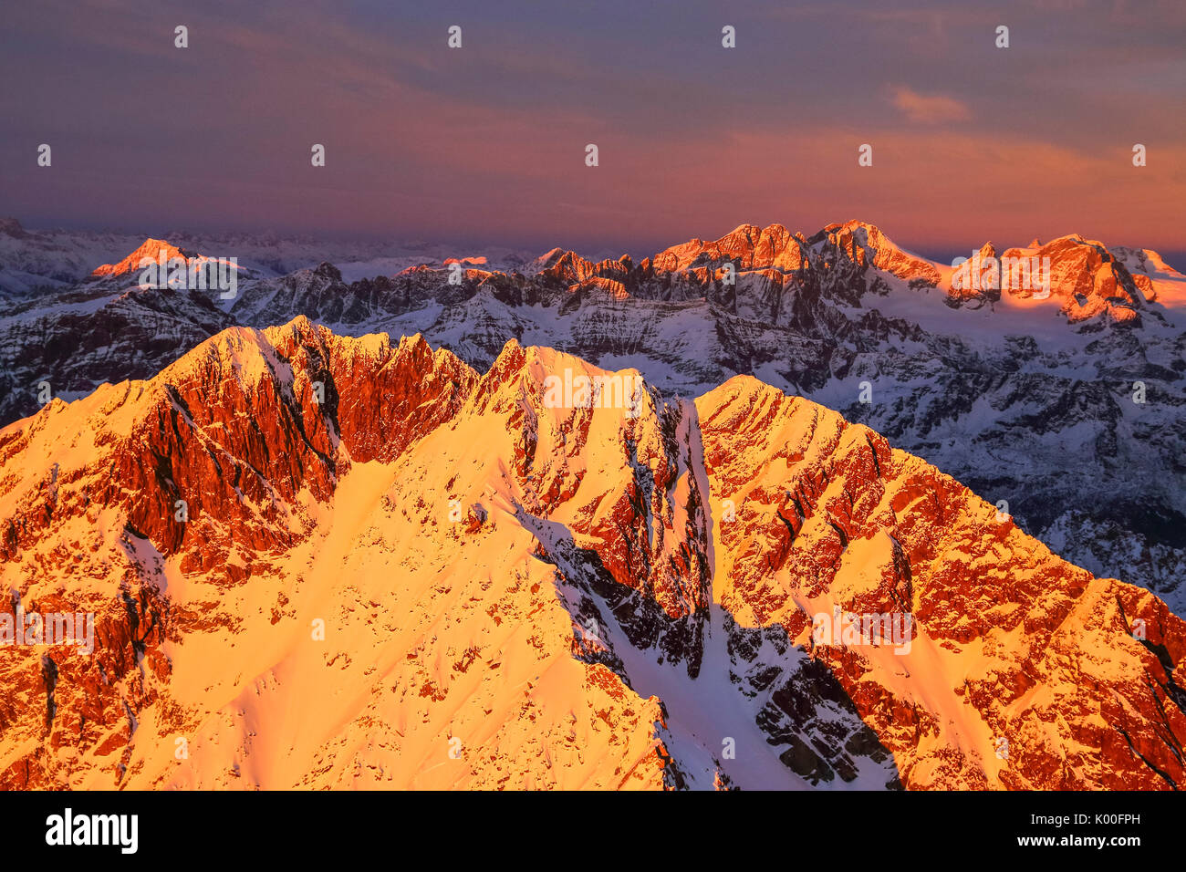 Aerial view of Mount Disgrazia and Bernina Group at sunset Masino ...